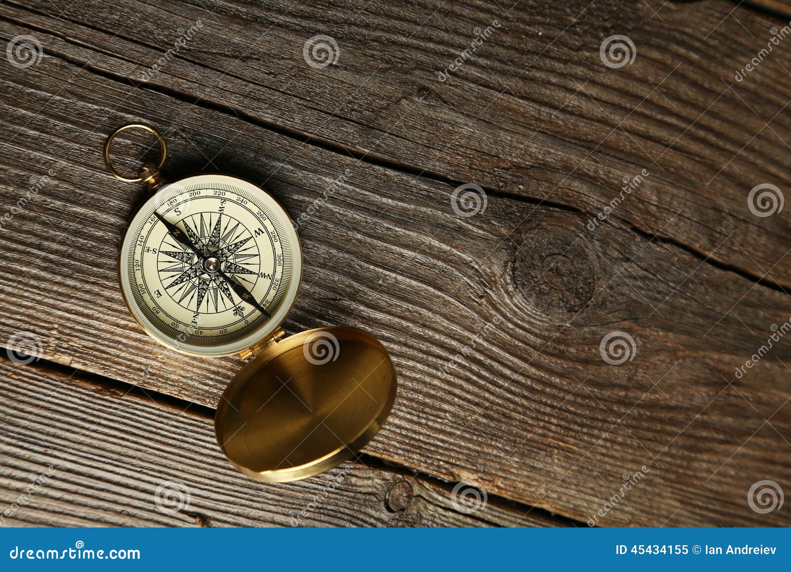Compass on Brown Wooden Background. Stock Image - Image of background ...