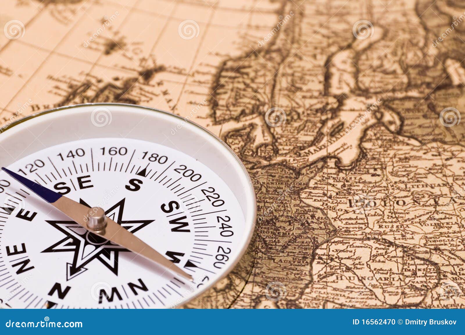 Compass on a card stock photo. Image of destinations - 16562470