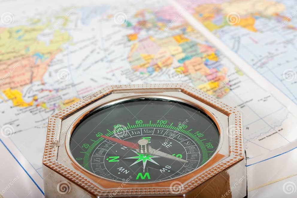 Compass close-up on map stock image. Image of north, west - 22833485