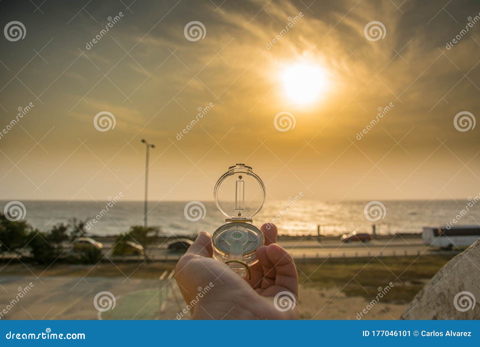 Compass Close Up with Nice Sunset Stock Image - Image of holding, hand ...