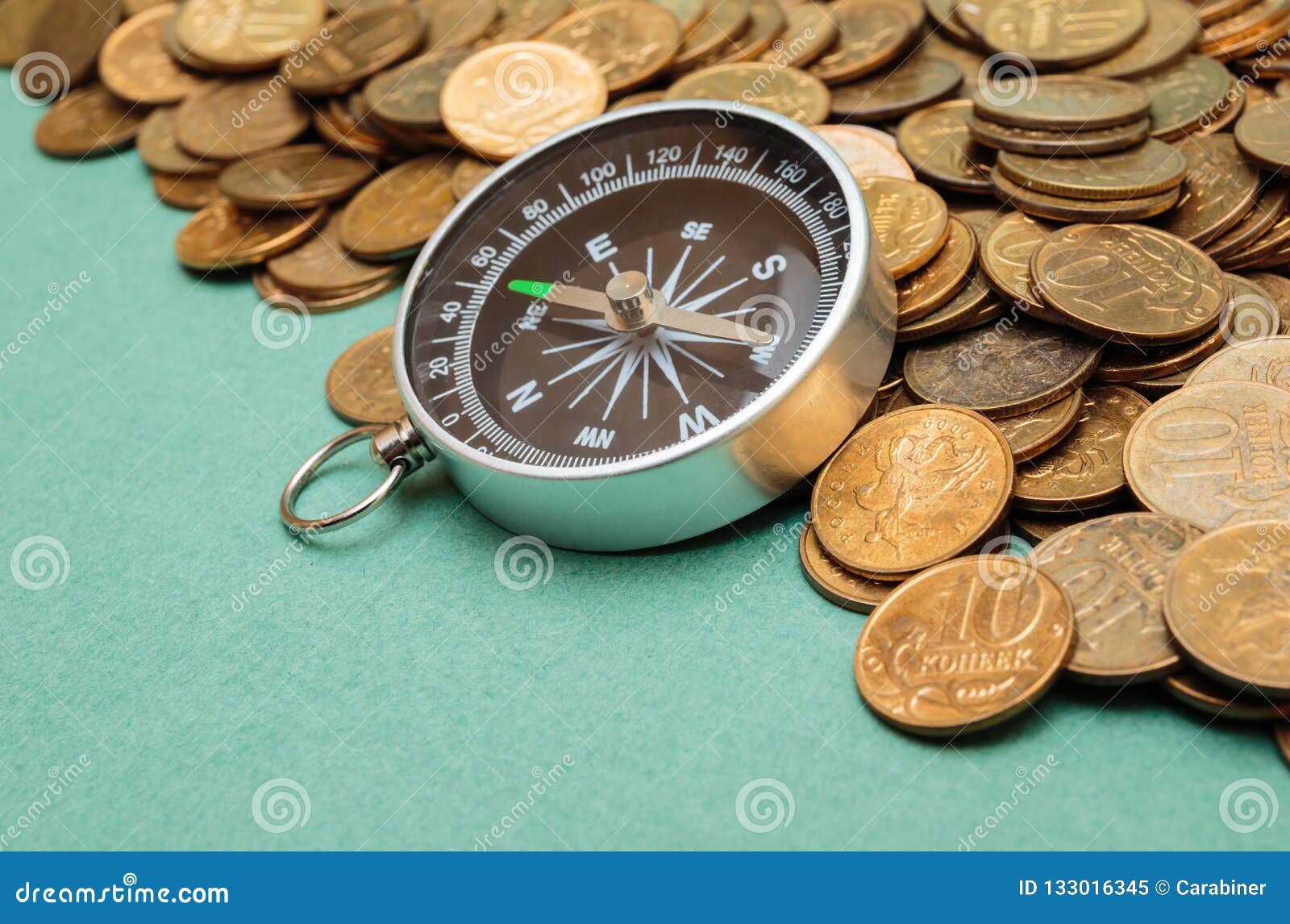 Compass on a coins stock image. Image of compass, treasure - 133016345