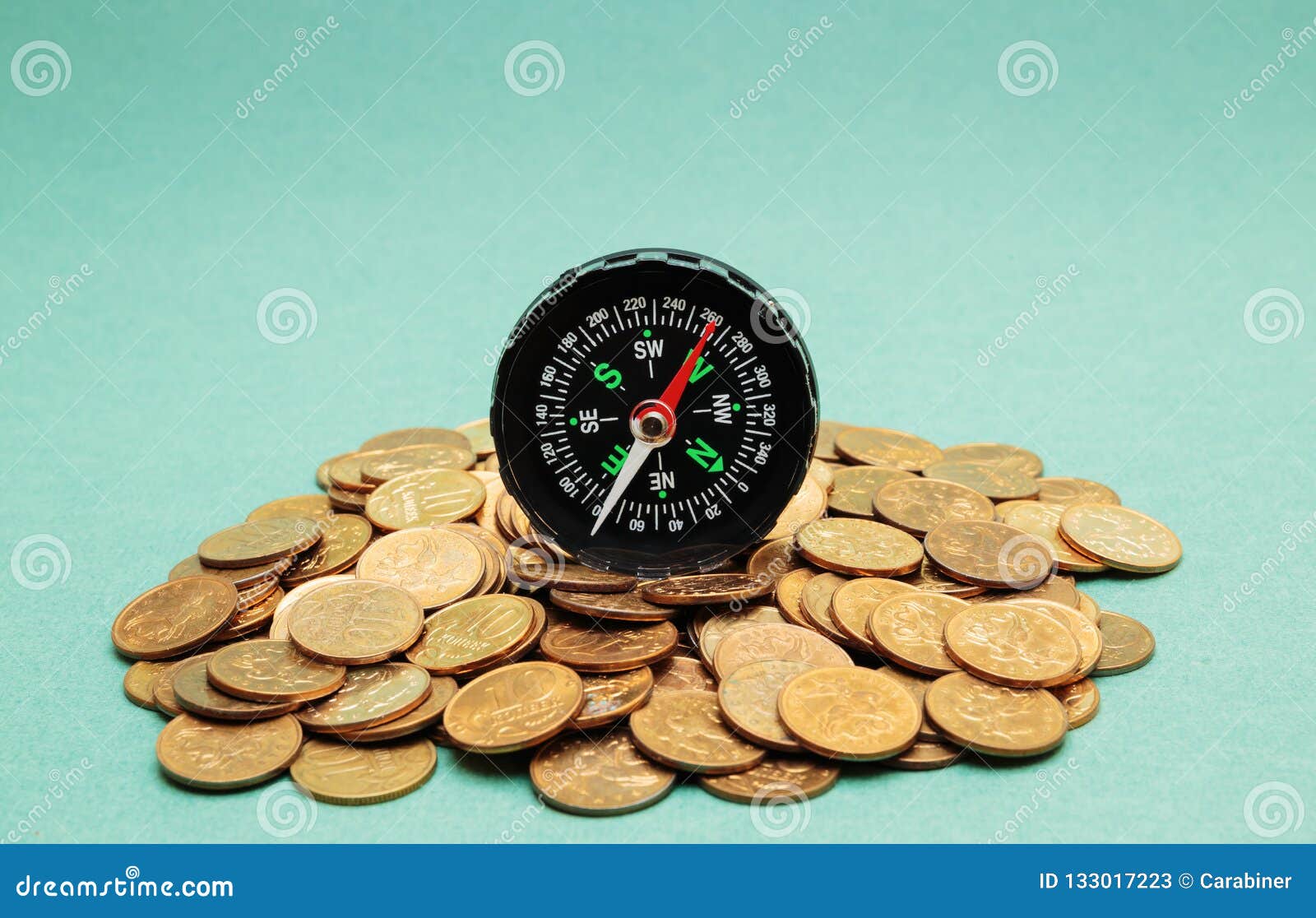 Compass on a coins stock image. Image of pattern, bank - 133017223
