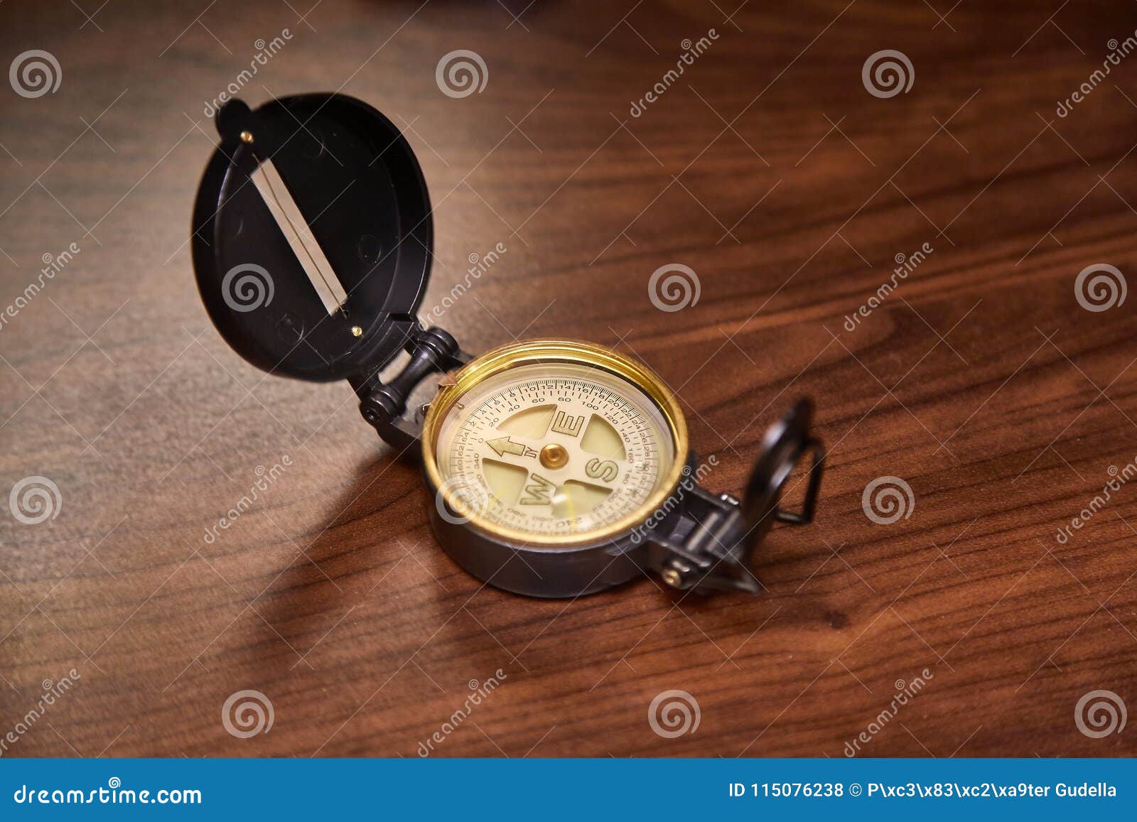 Compass on a desk stock photo. Image of equipment, magnetic - 115076238