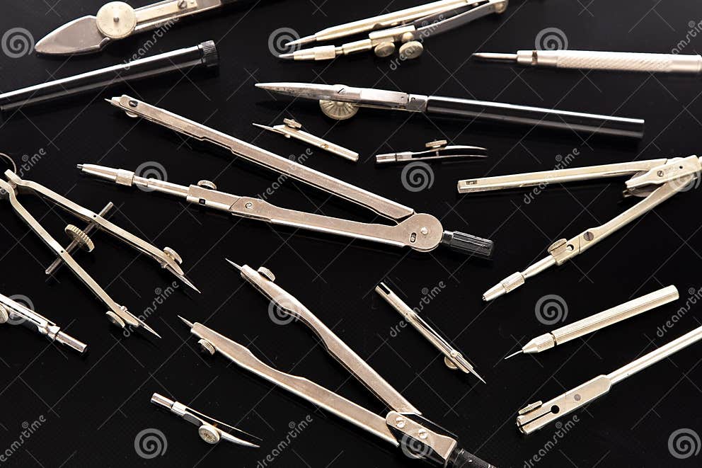 Set of Old Different Compasses. Retro Metal Compasses and Drafting ...