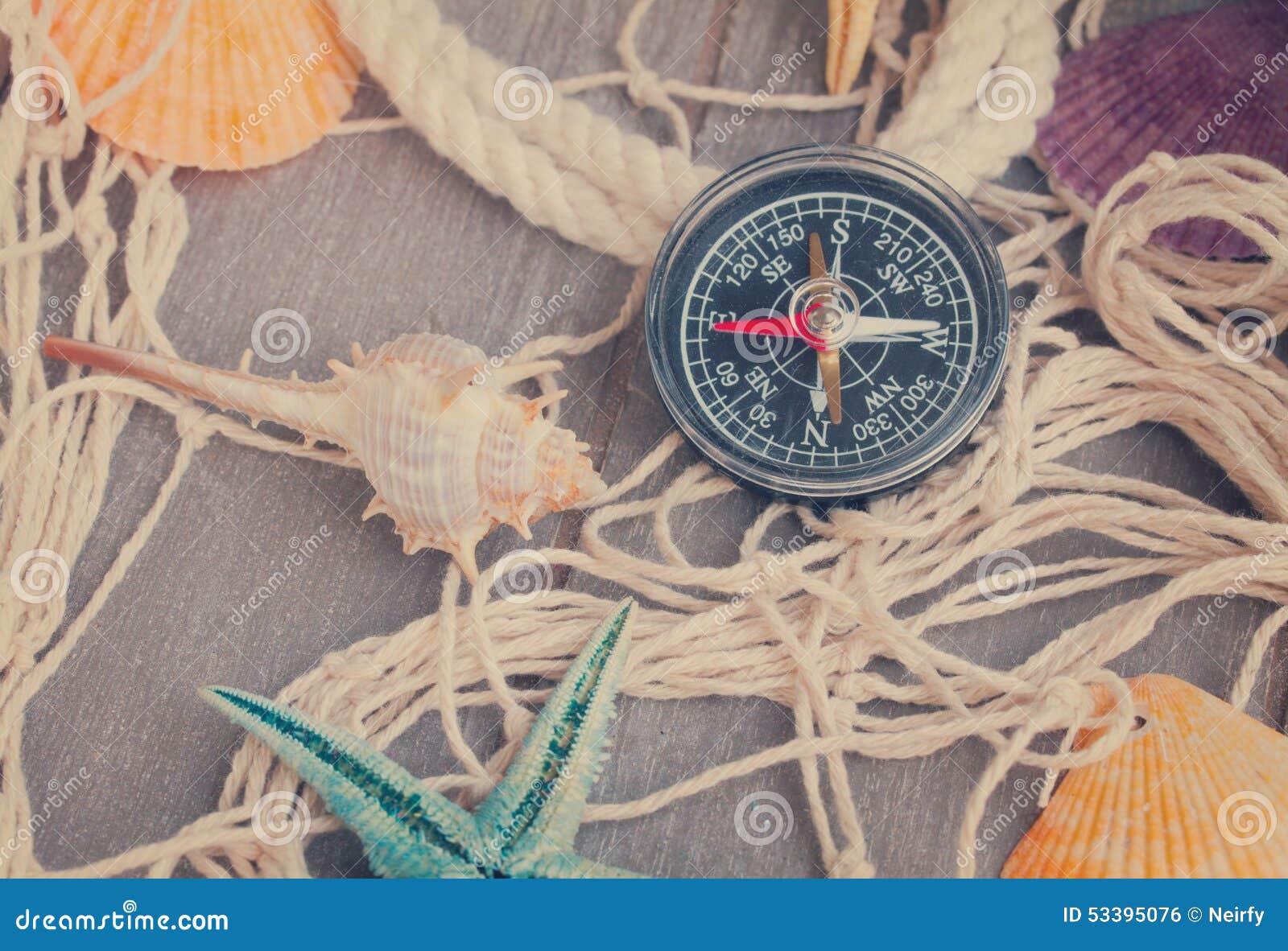 Compass on Fishing Net with Tag Stock Photo - Image of connection ...