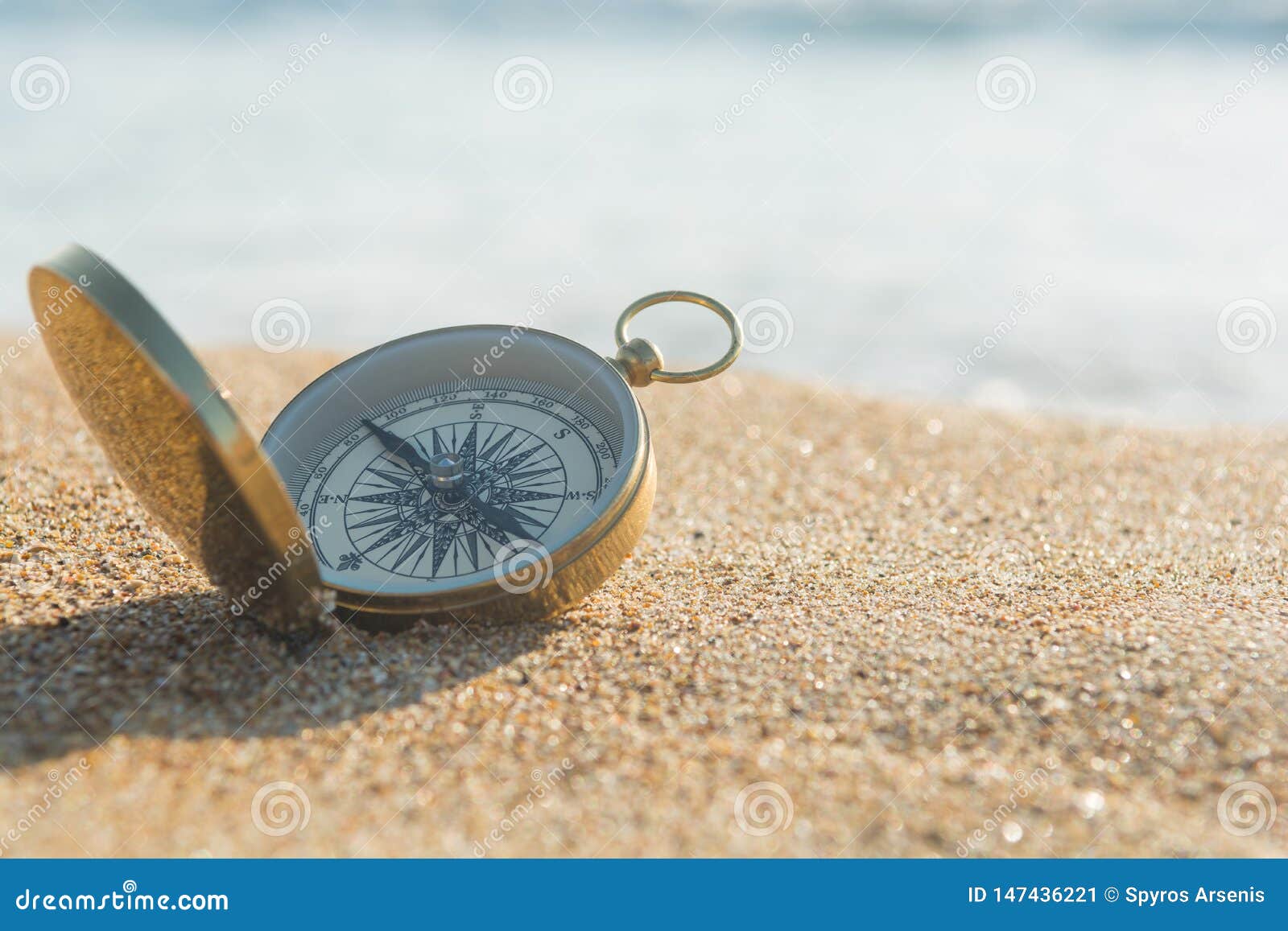 Compass on the Golden Sand by the Sea Stock Image - Image of concept ...