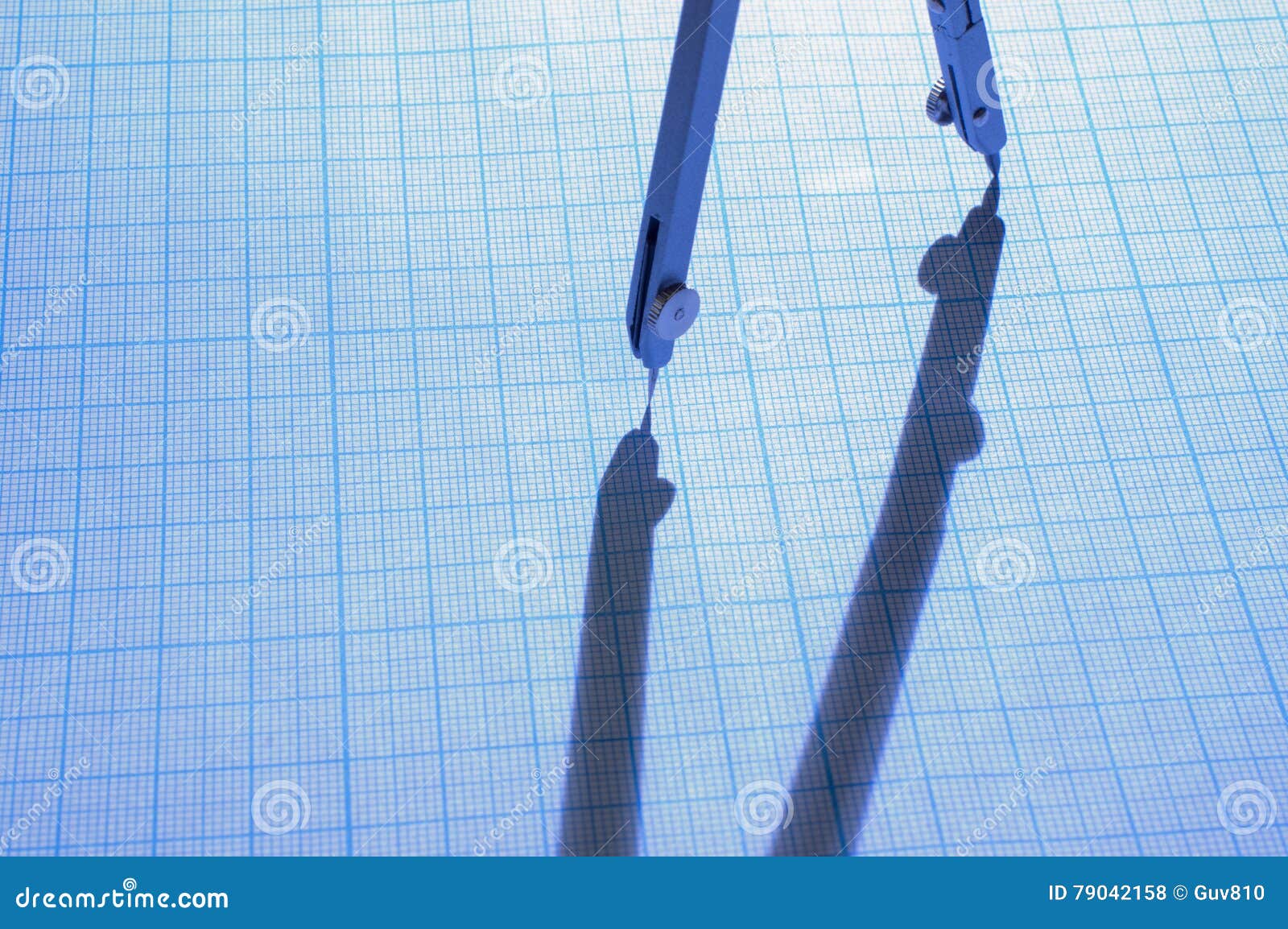 Compass on graph paper stock photo. Image of shape, reflection - 79042158