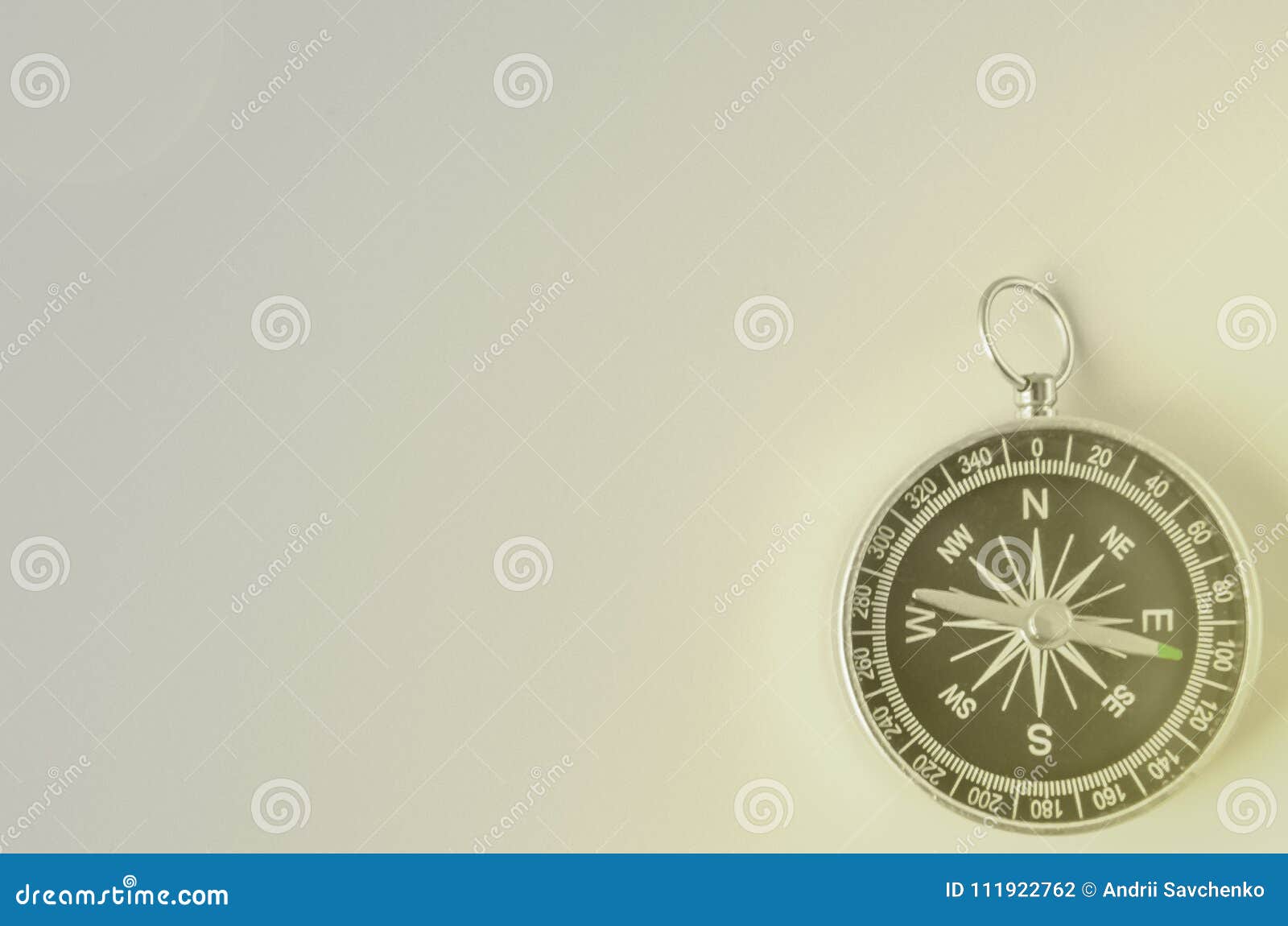 Compass on gray background stock photo. Image of object - 111922762