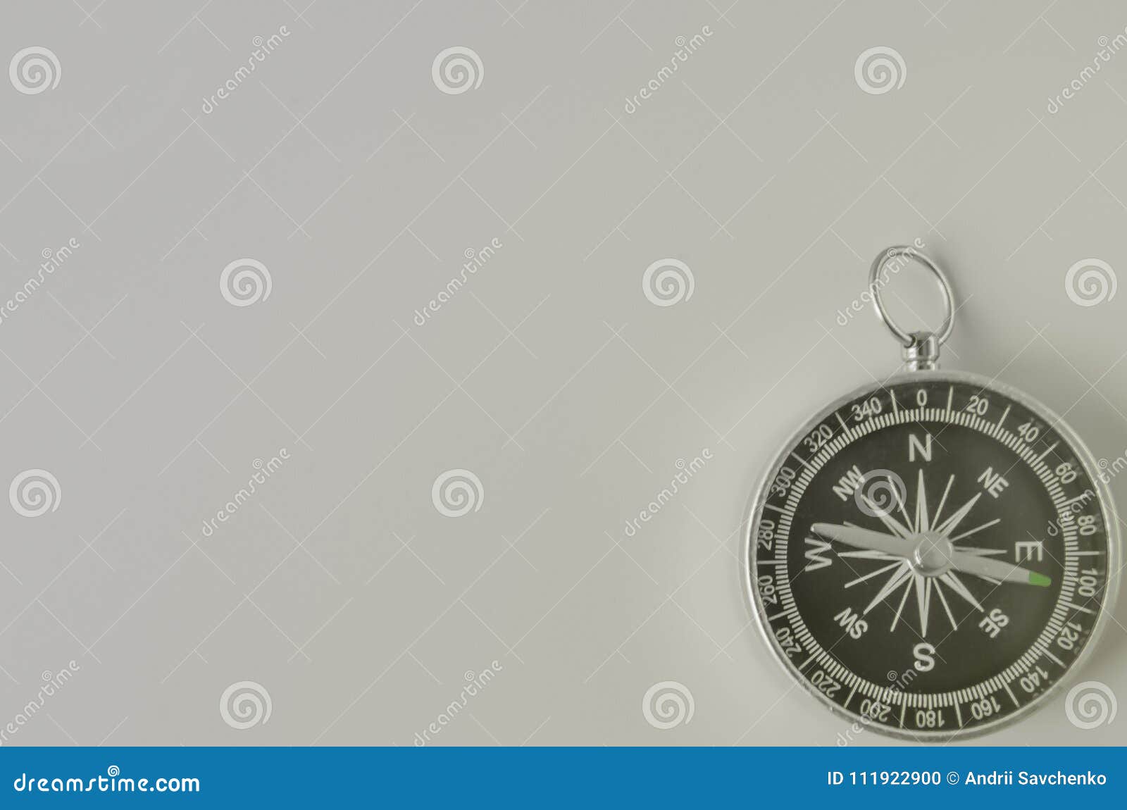 Compass on gray background stock photo. Image of close - 111922900