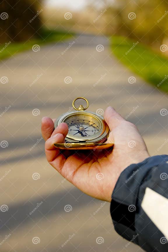 Compass in hand stock photo. Image of male, journey, compass - 2208902