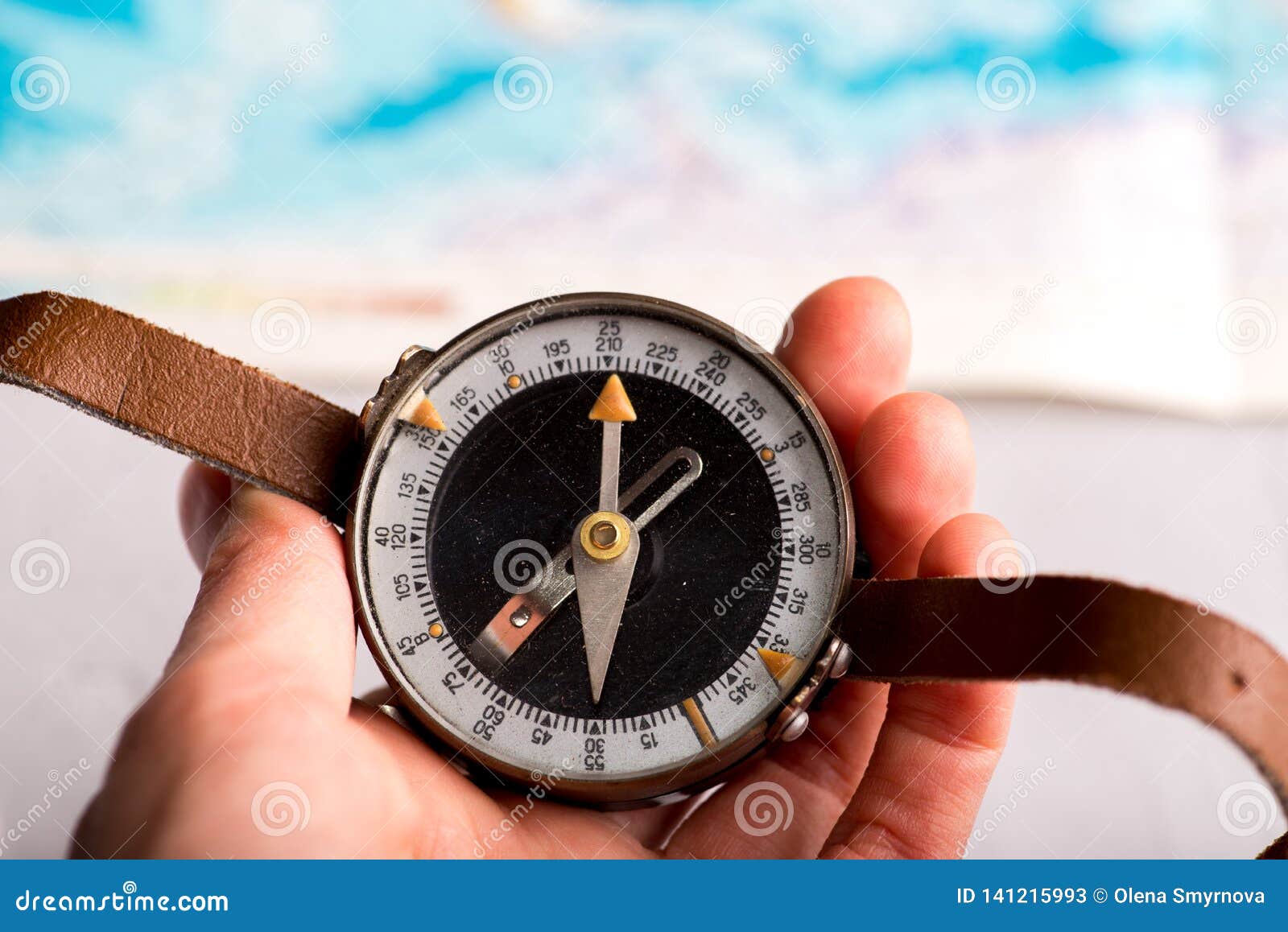 Compass in hand stock image. Image of hand, guide, background - 141215993