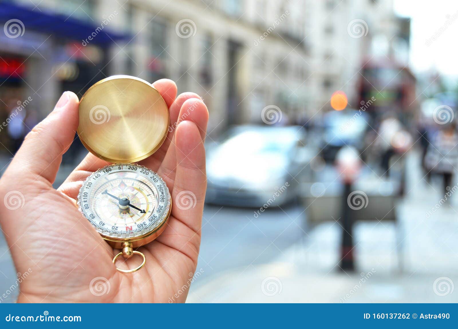 Compass in the hand stock photo. Image of orientation - 160137262