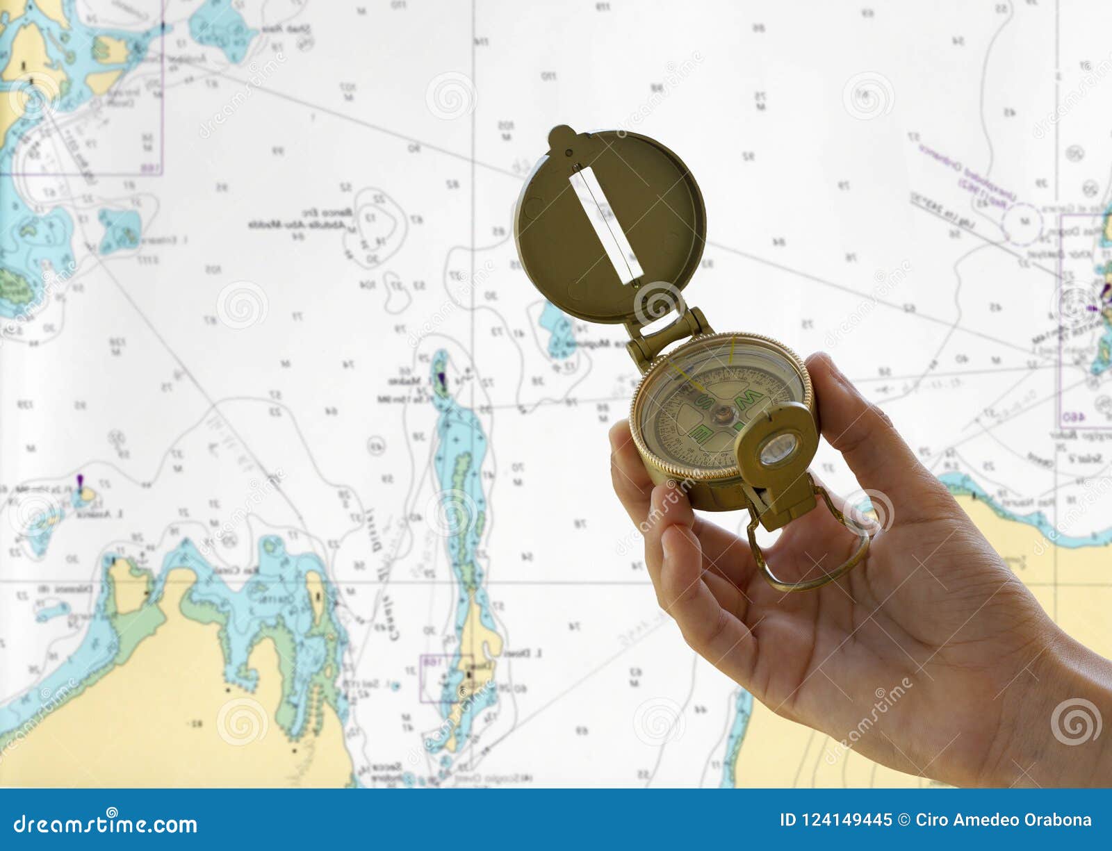 Compass in hand stock image. Image of nautical, chart - 124149445