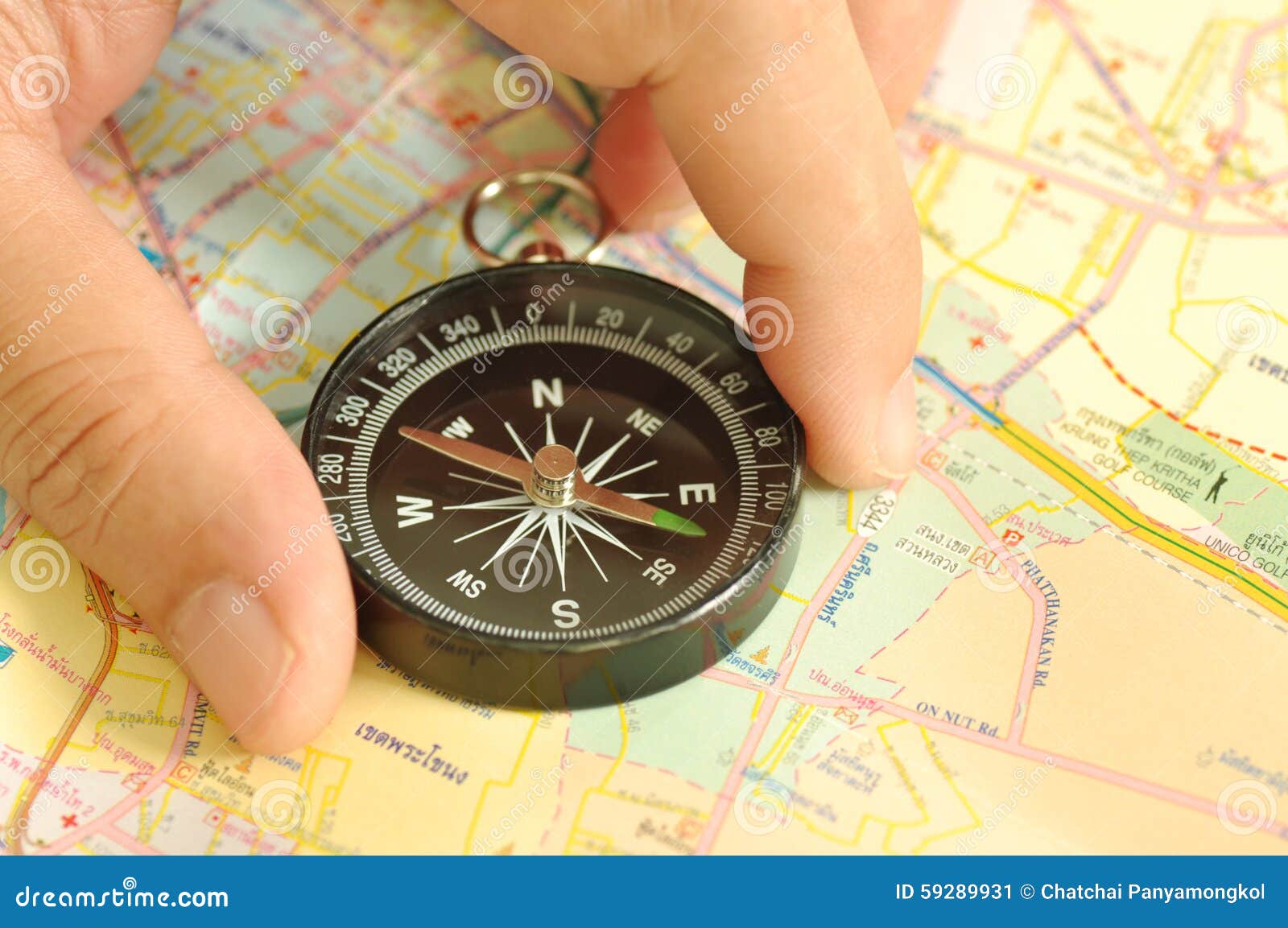 Compass in Hand Navigating on Map Pape Stock Image - Image of abstract ...