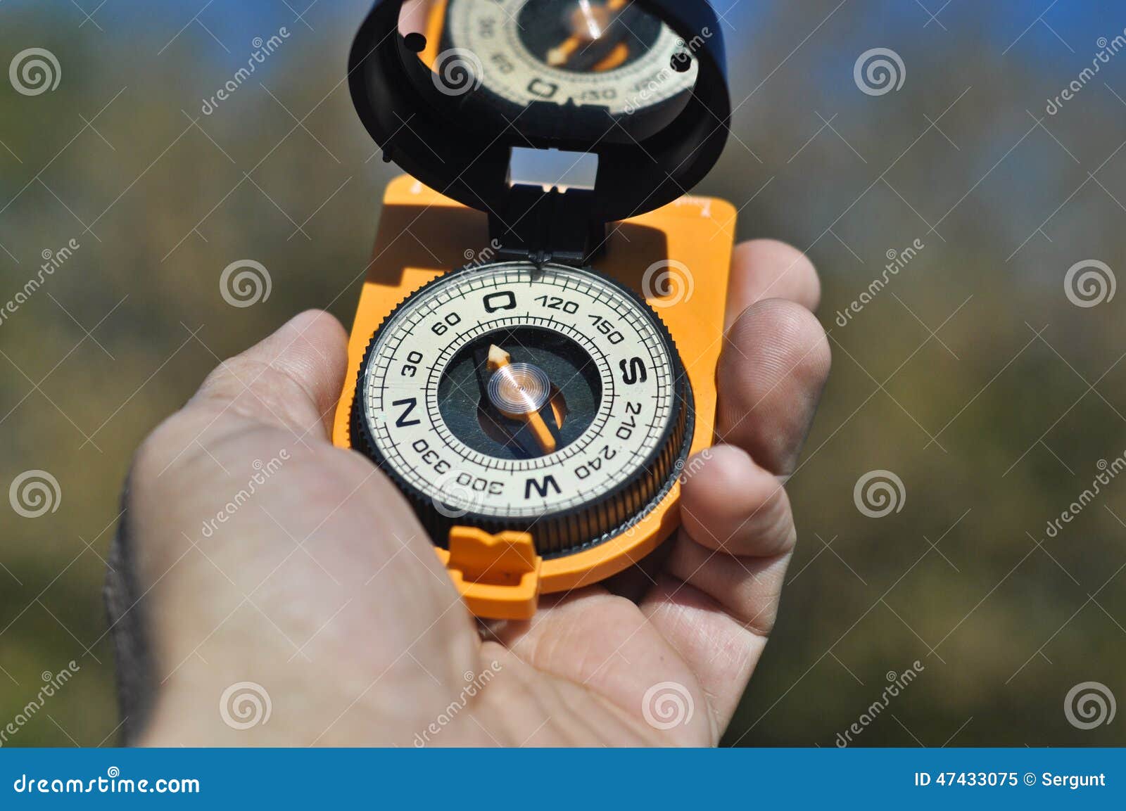 Compass in hand. stock image. Image of orienteering, object - 47433075