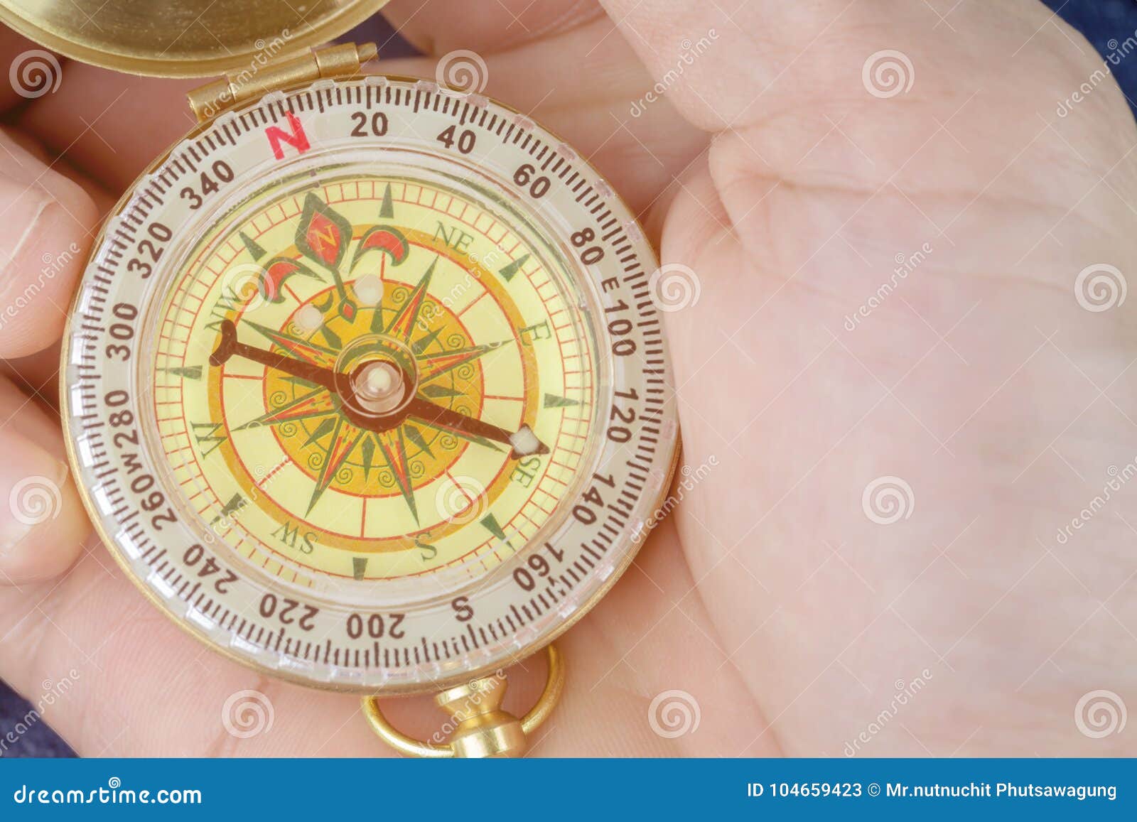 Compass in the hand stock image. Image of finger, guidance - 104659423