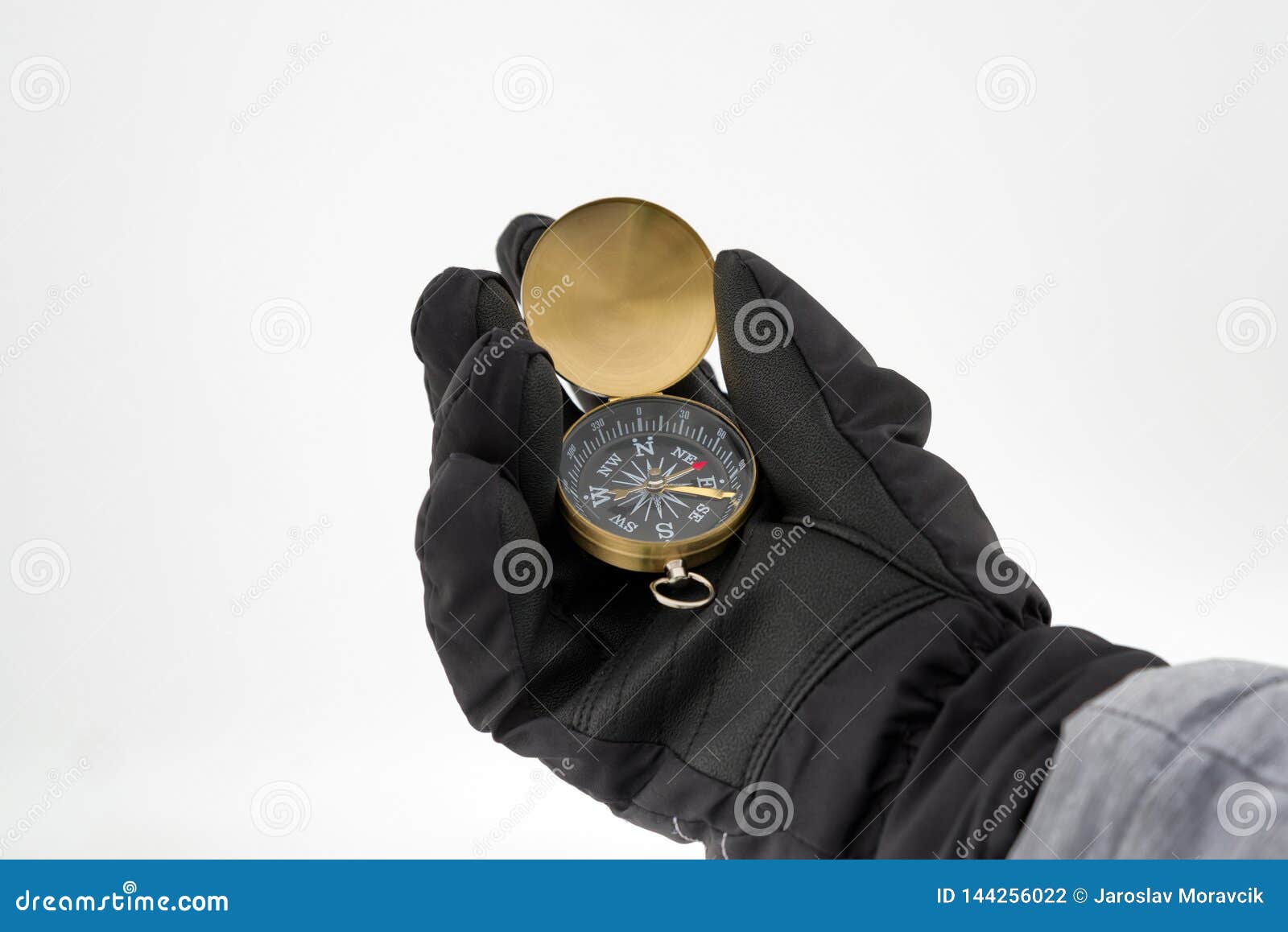 Compass in hands stock photo. Image of expedition, weather - 144256022