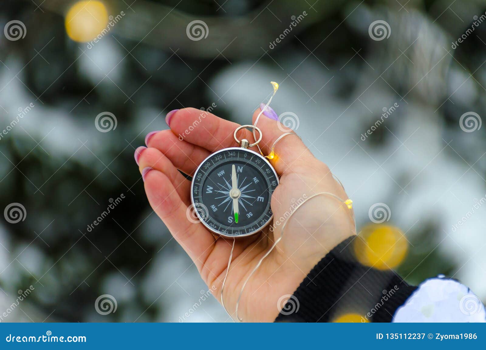 The Compass in the Hands during the Winter Travel Stock Image - Image ...