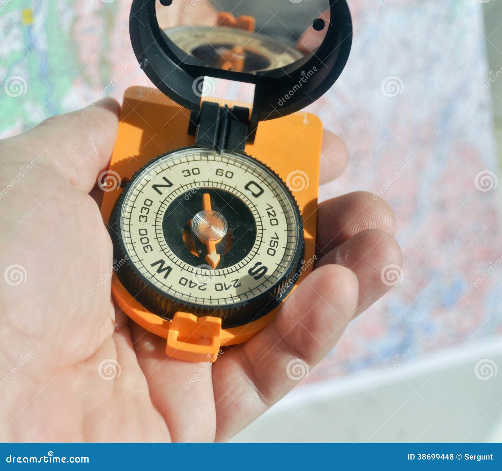 The compass in his hand. stock photo. Image of finding - 38699448