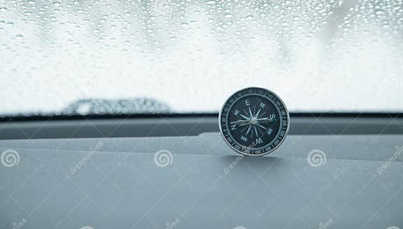 Compass inside the car stock photo. Image of outdoor - 305767016