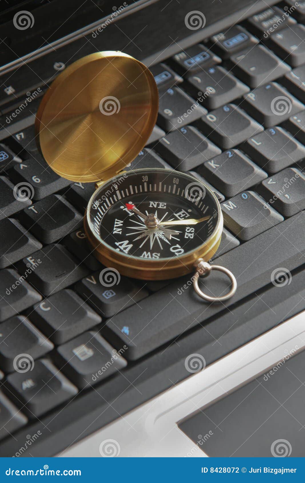 Compass on the laptop stock photo. Image of keys, communications - 8428072