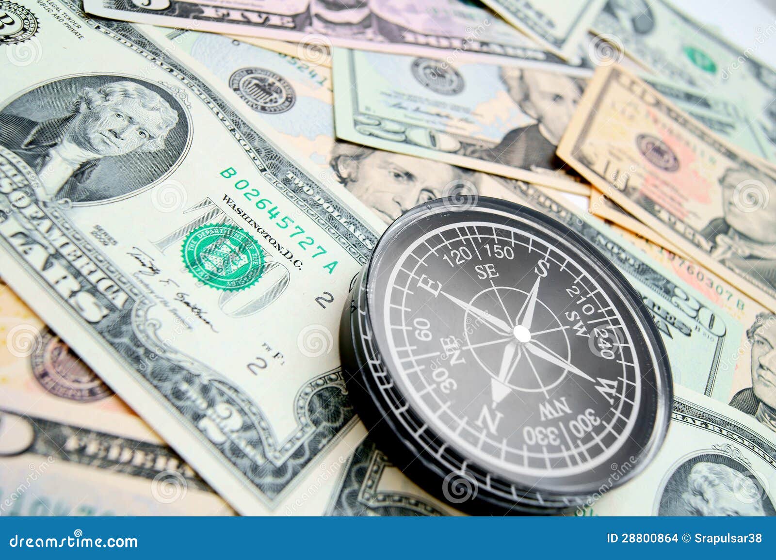 The Compass and is a Lot of Money. Stock Photo - Image of circle ...