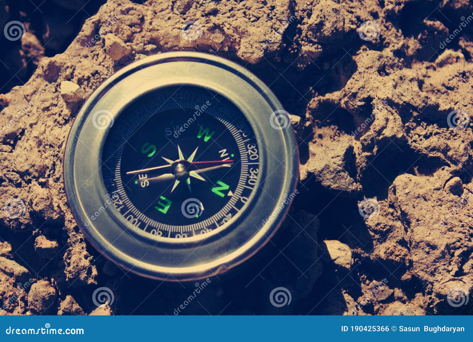 Compass Lying on the Ground Stock Photo - Image of navigational, arrow ...
