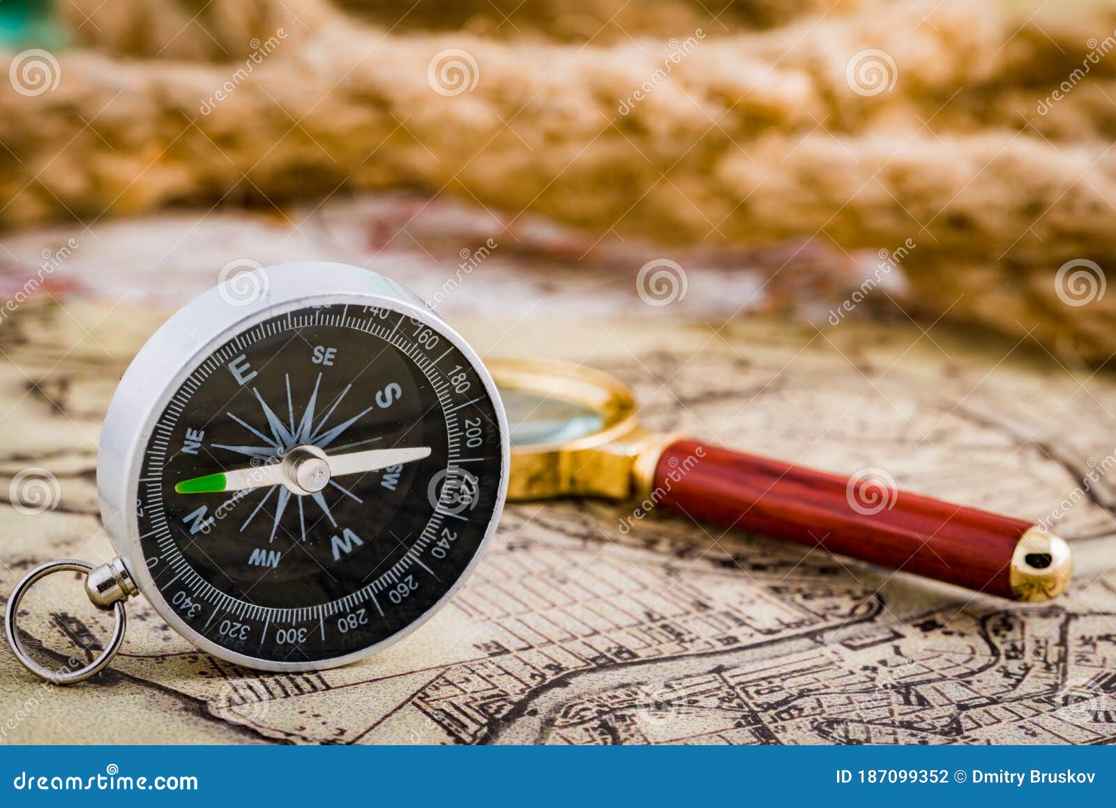 Compass and Magnifying Glass Stock Photo - Image of cartography, page ...