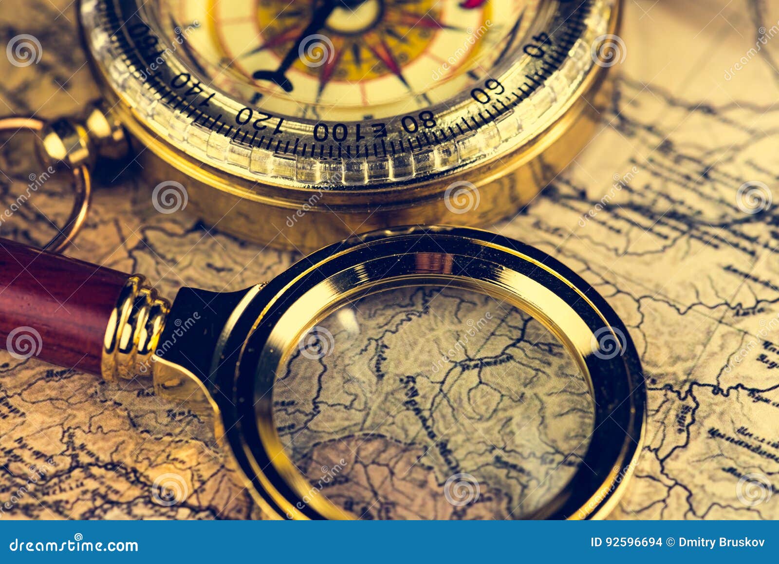 Compass and Magnifying Glass Stock Photo - Image of earth, physical ...