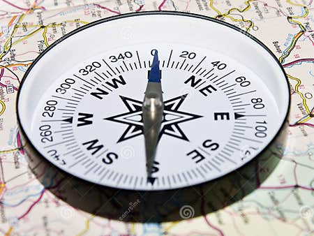 Compass on a map stock image. Image of compass, lost - 13682463