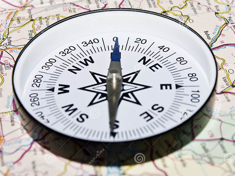 Compass on a map stock image. Image of compass, lost - 13682463