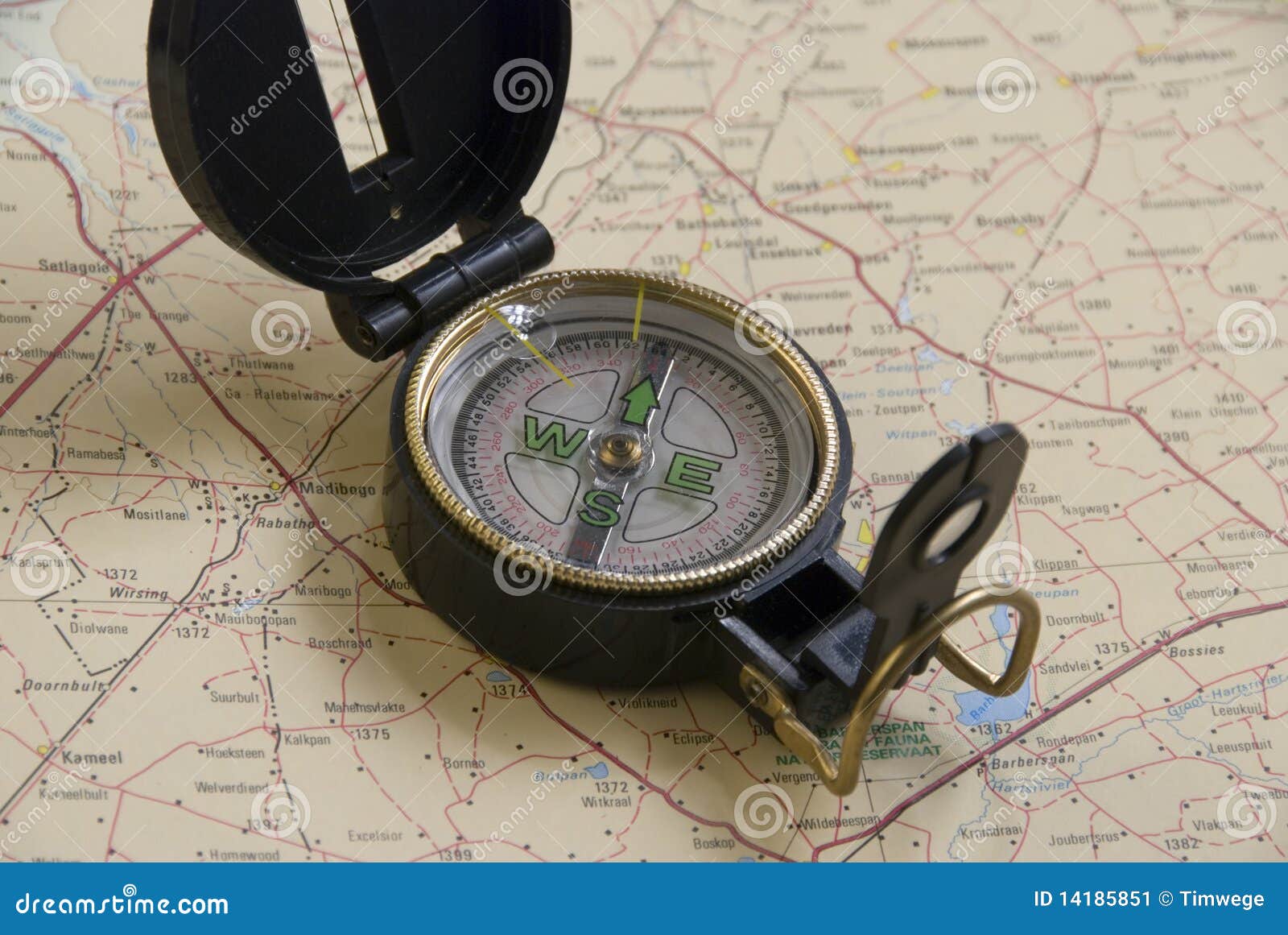 Compass on a map stock image. Image of travel, north - 14185851