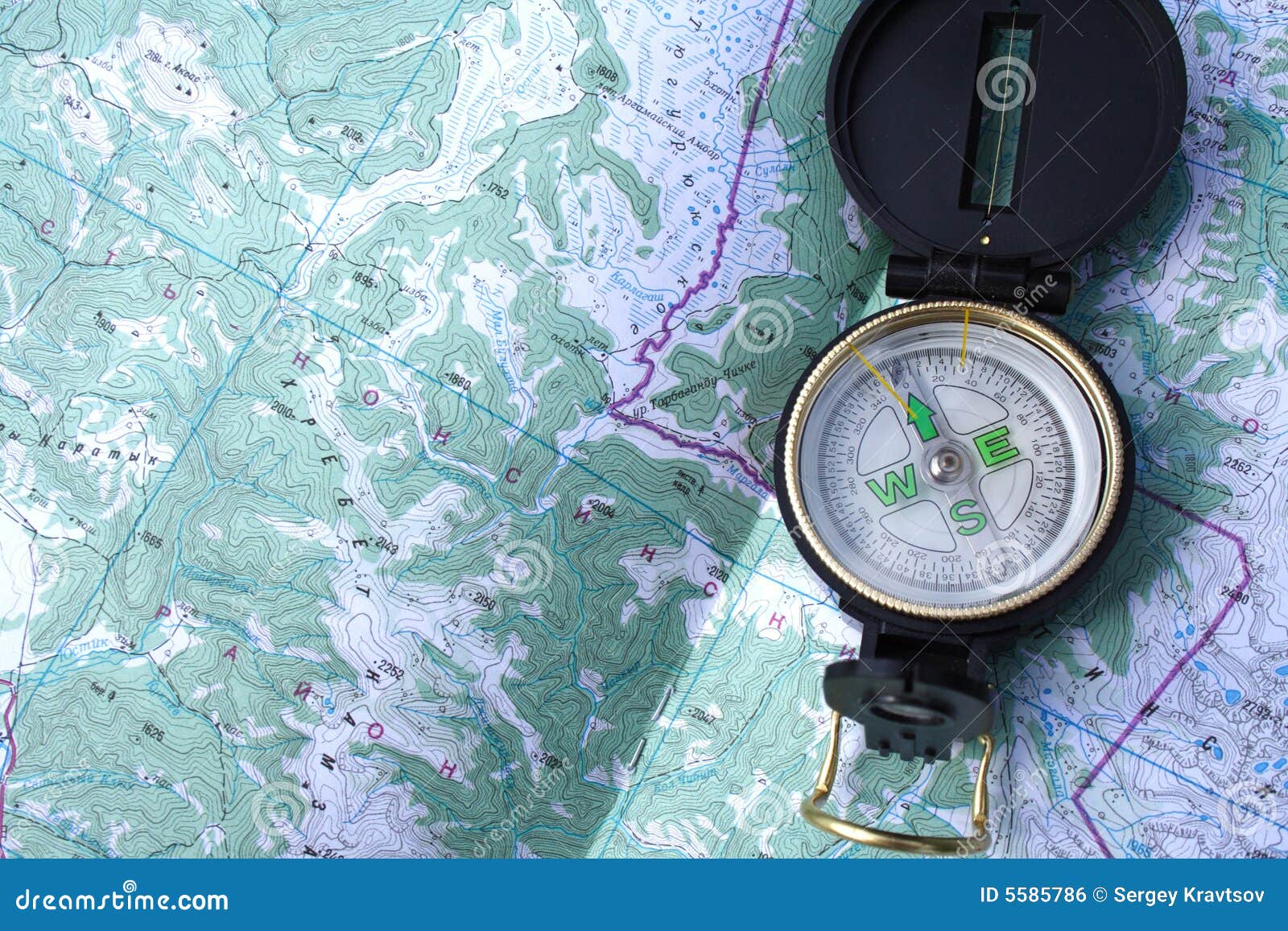Compass on the map stock photo. Image of hand, west, navigational - 5585786