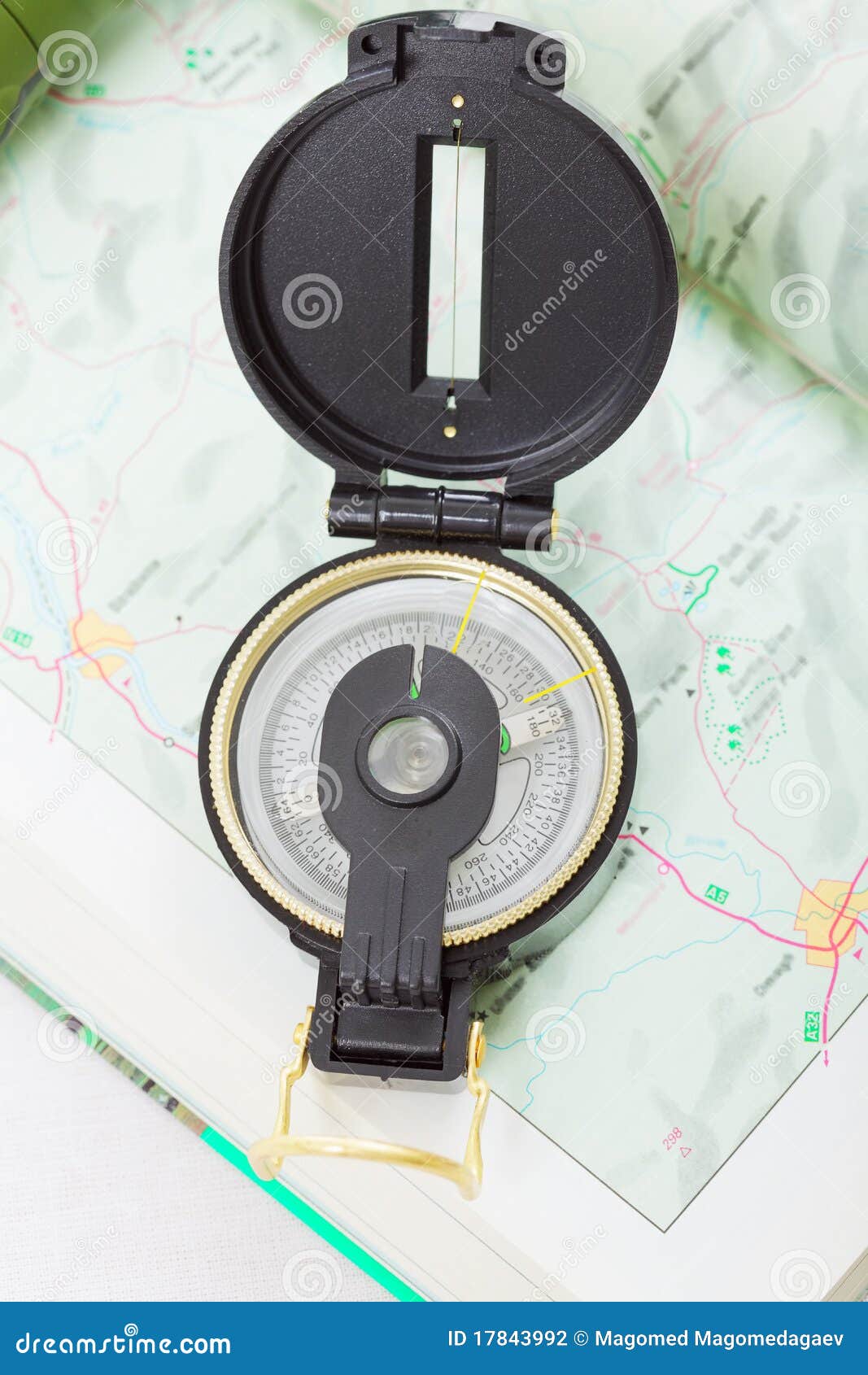 Compass on map above view stock photo. Image of magnet - 17843992