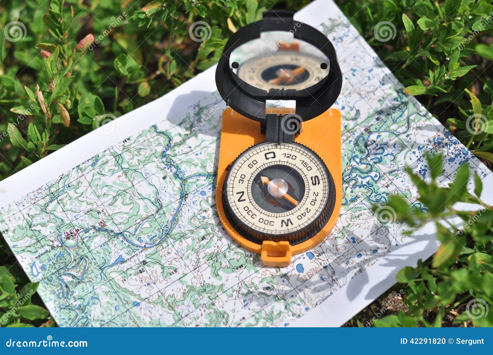 Compass on the map. stock photo. Image of geography, hiking - 42291820
