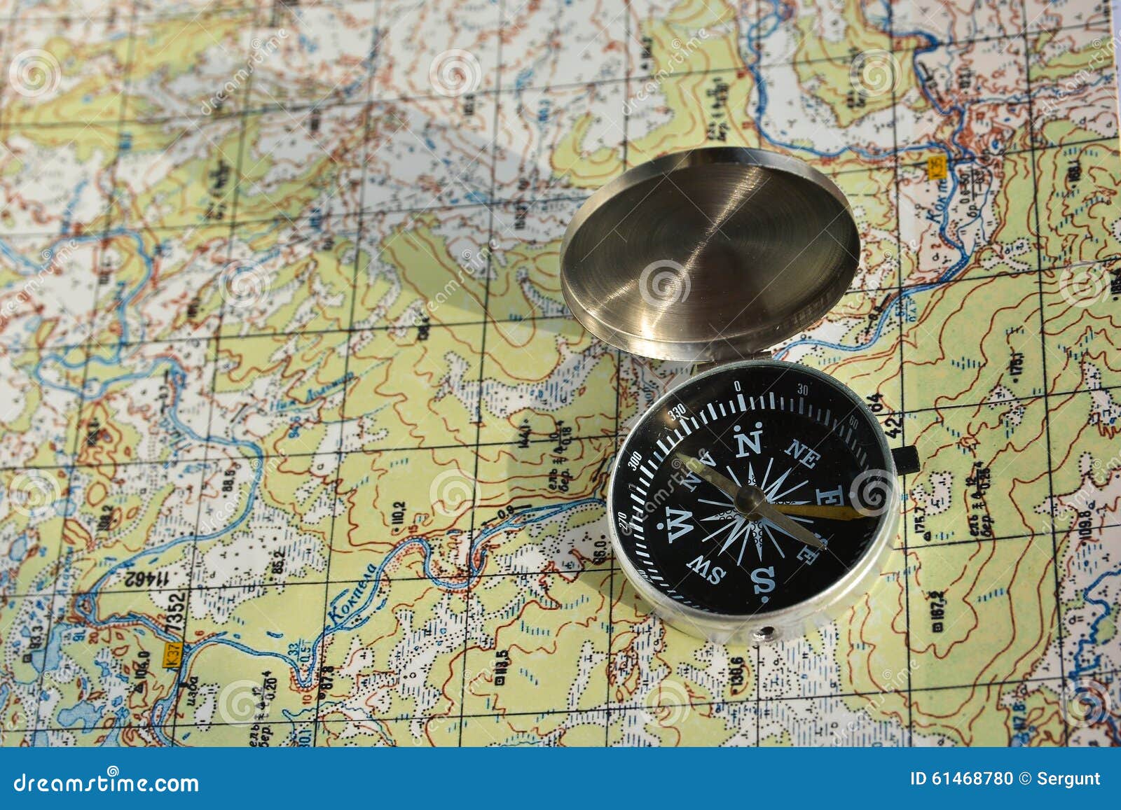 Compass and a map stock photo. Image of activity, cartography - 61468780