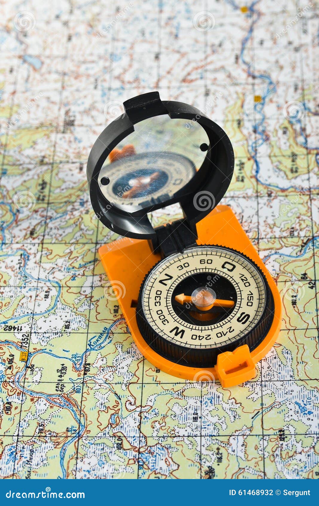 Compass on the map. stock photo. Image of discovery, macro - 61468932