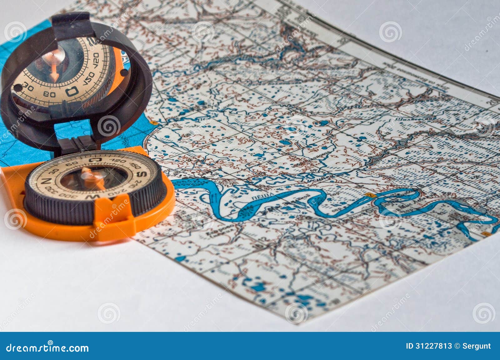 Compass and a map. stock image. Image of move, globe - 31227813