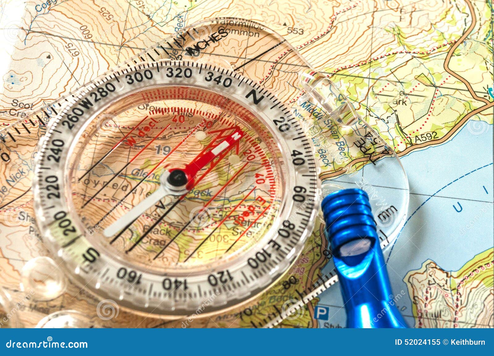 Compass on Map and Rescue Whistle Stock Image - Image of rescue ...
