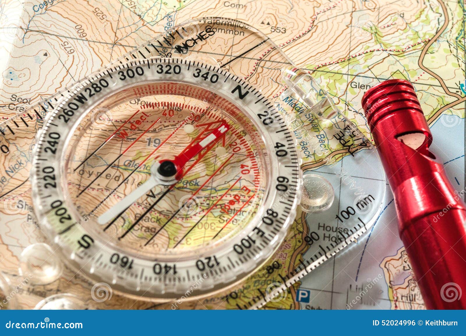 Compass on Map and Rescue Whistle Stock Photo - Image of confusion ...