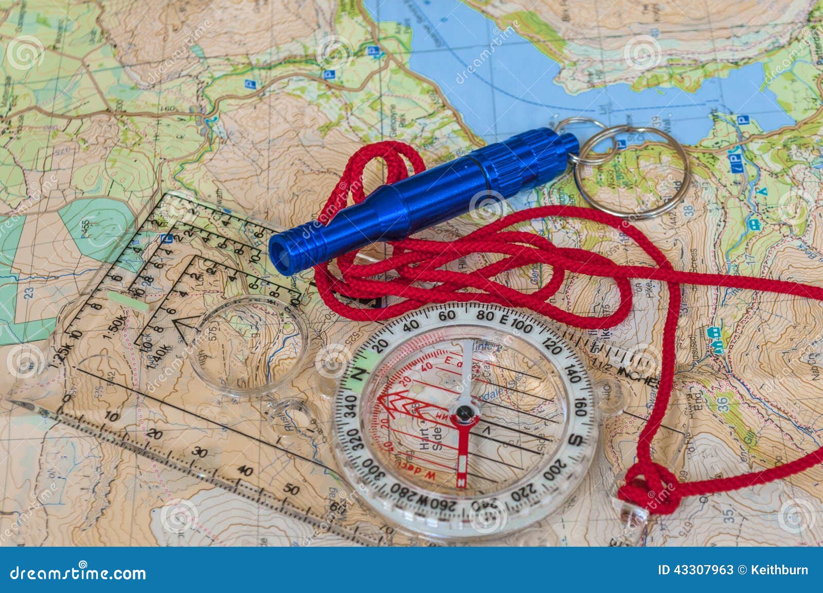 Compass on Map and Rescue Whistle Stock Image - Image of direction ...