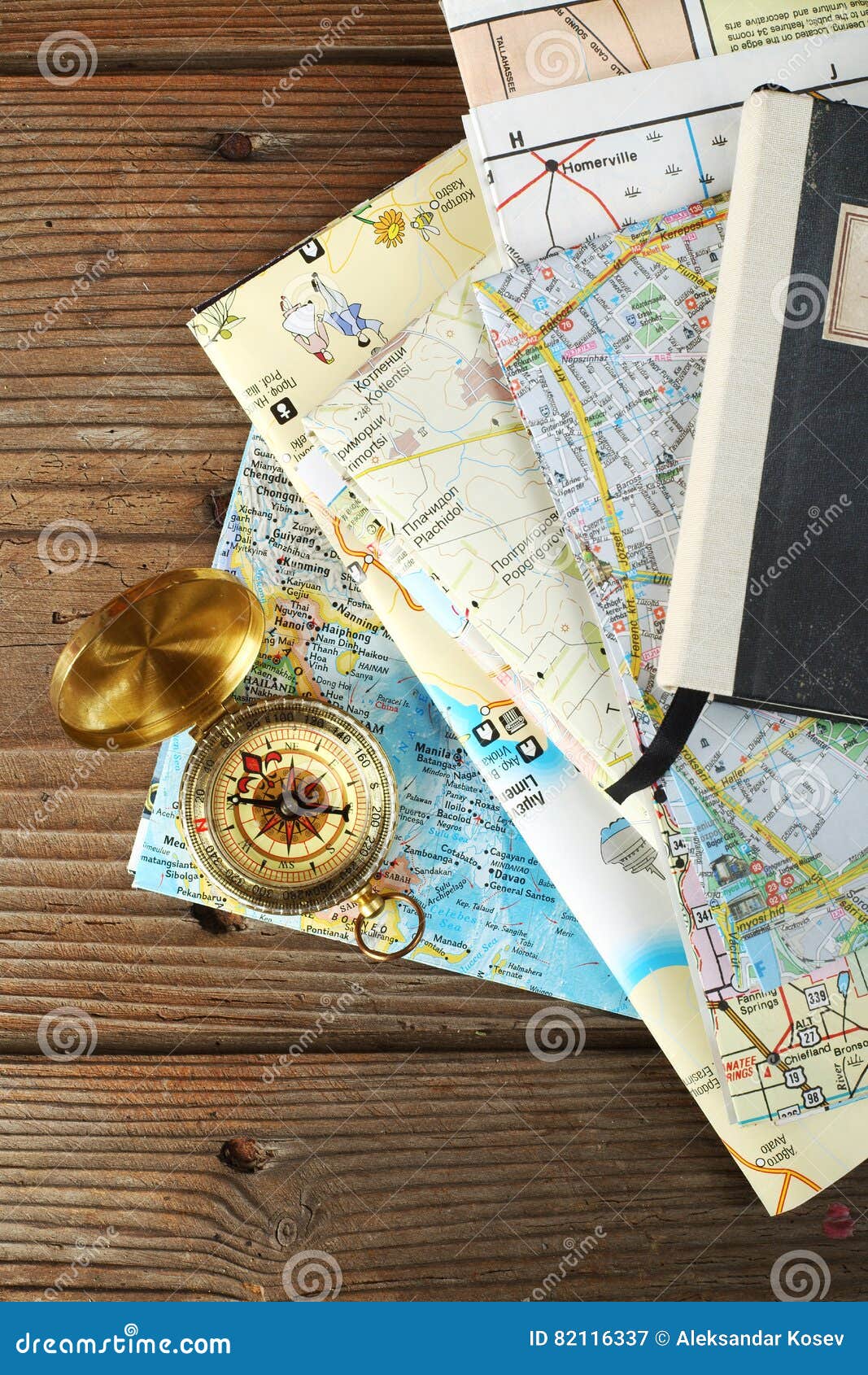 Compass And Maps Stock Image | CartoonDealer.com #82116337