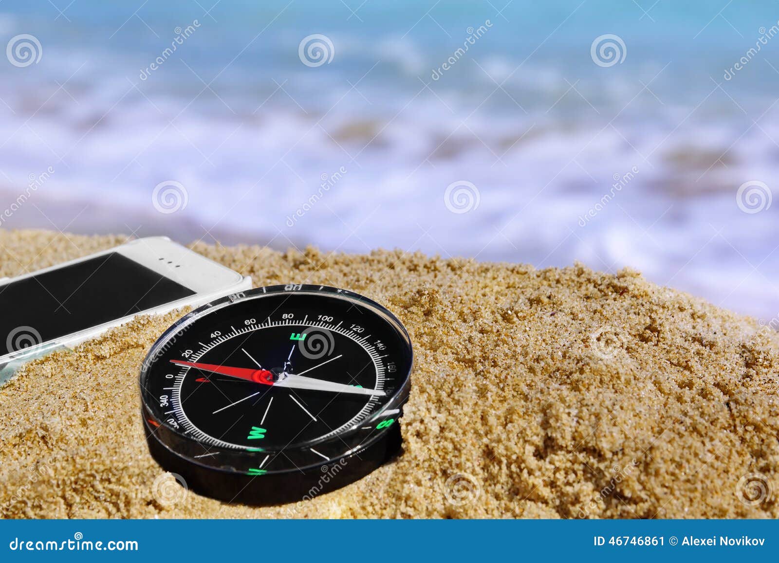 104 Compass Mobile Phone Beach Stock Photos - Free & Royalty-Free Stock ...