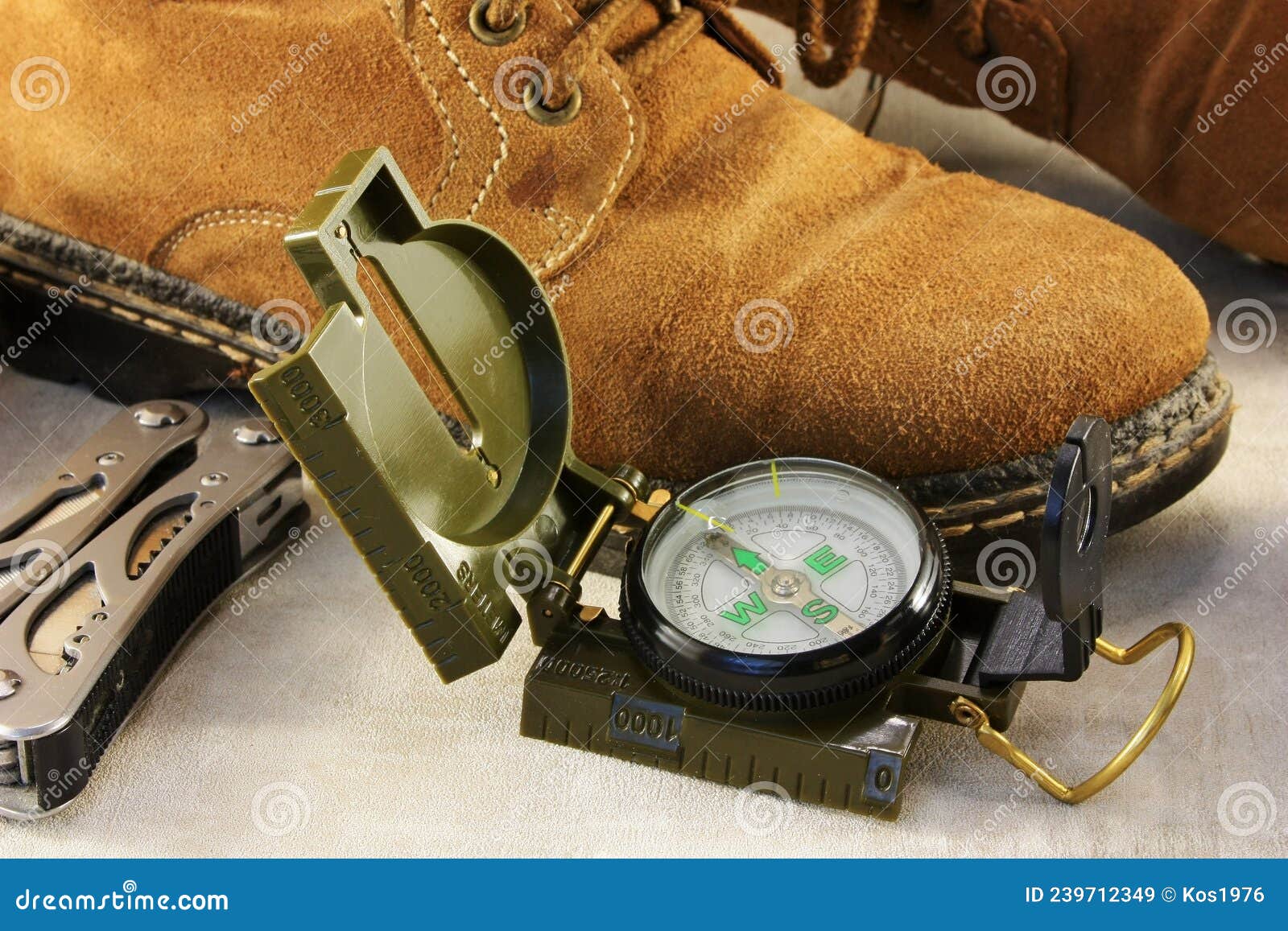 Compass, Multi-tool and Old Hiking Boots Stock Image - Image of ...