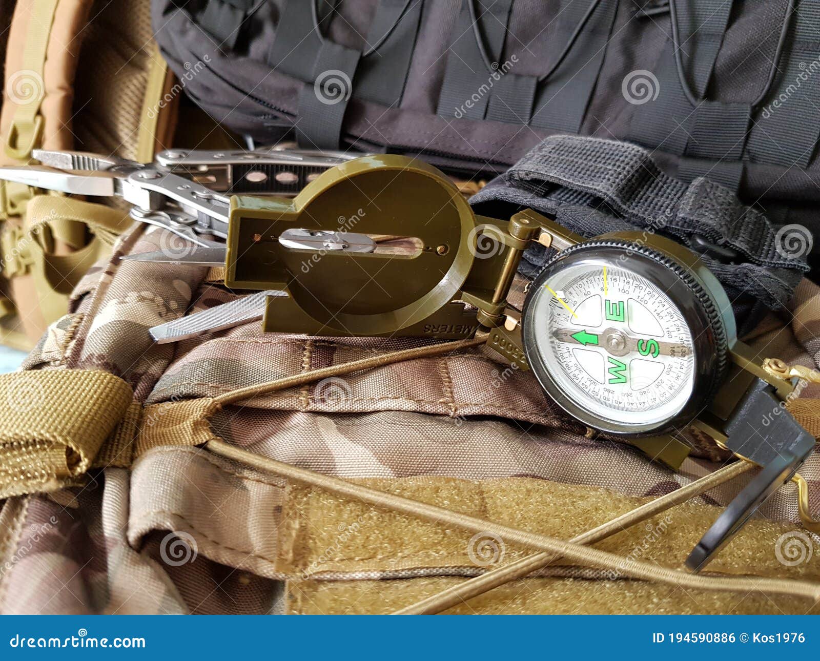 Compass and Multitool are in the Backpack Stock Photo - Image of hiking ...
