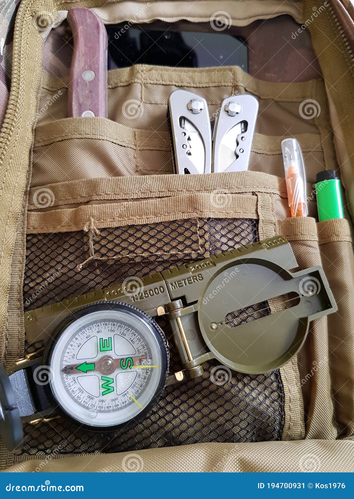 Compass and Multitool are in the Backpack Stock Image - Image of ...