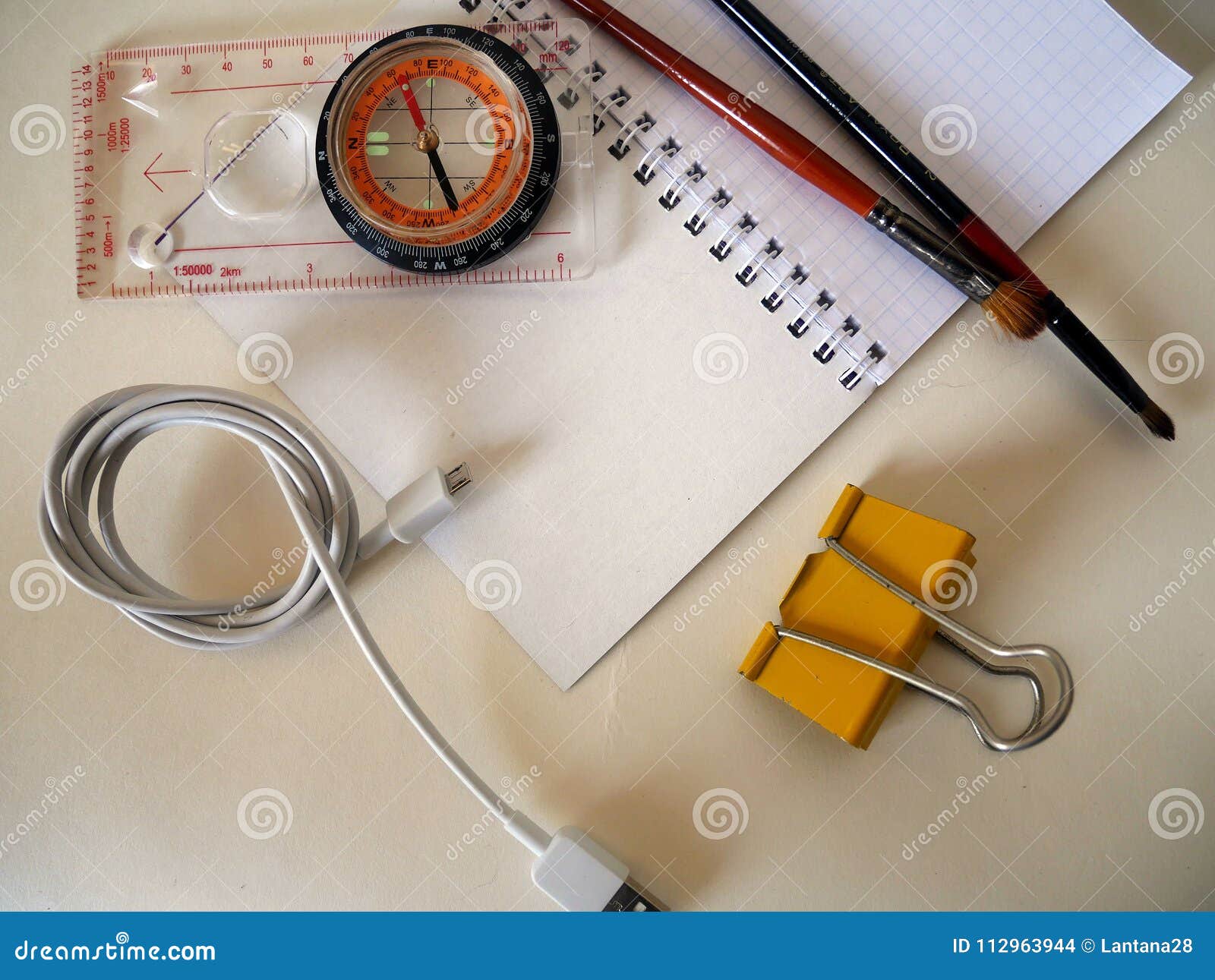 A Compass and Objects on a White Background Stock Photo - Image of ...