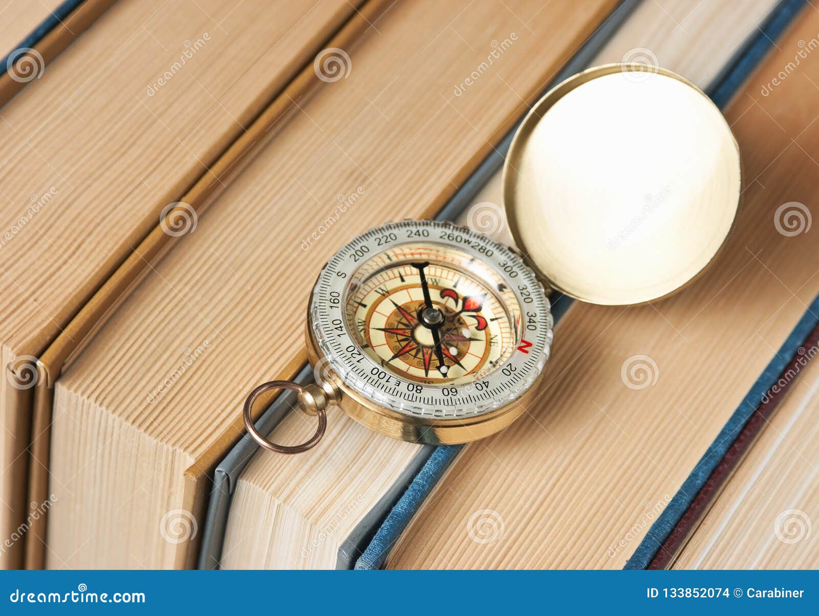Compass and books stock photo. Image of science, study - 133852074