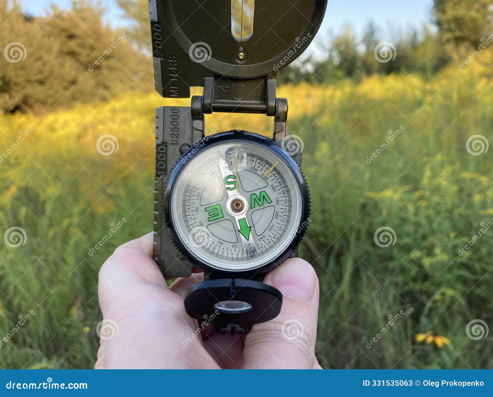 Compass for Orientation on the Terrain during a Hike Stock Image ...