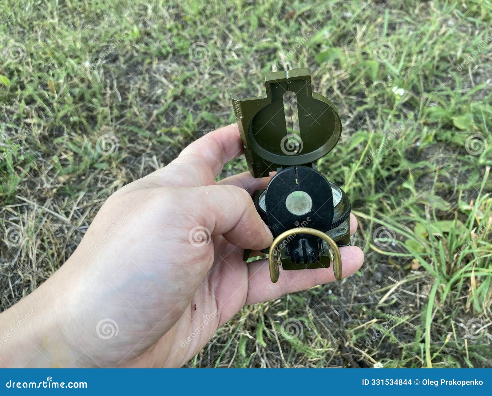Compass for Orientation on the Terrain during a Hike Stock Photo ...